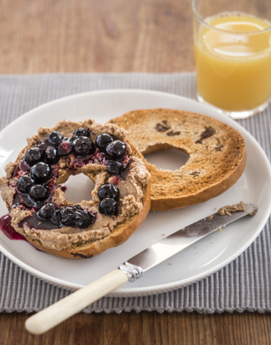 Cinnamon and Raisin Bagel with Toasted Nut Butter and Hot Blueberries ...